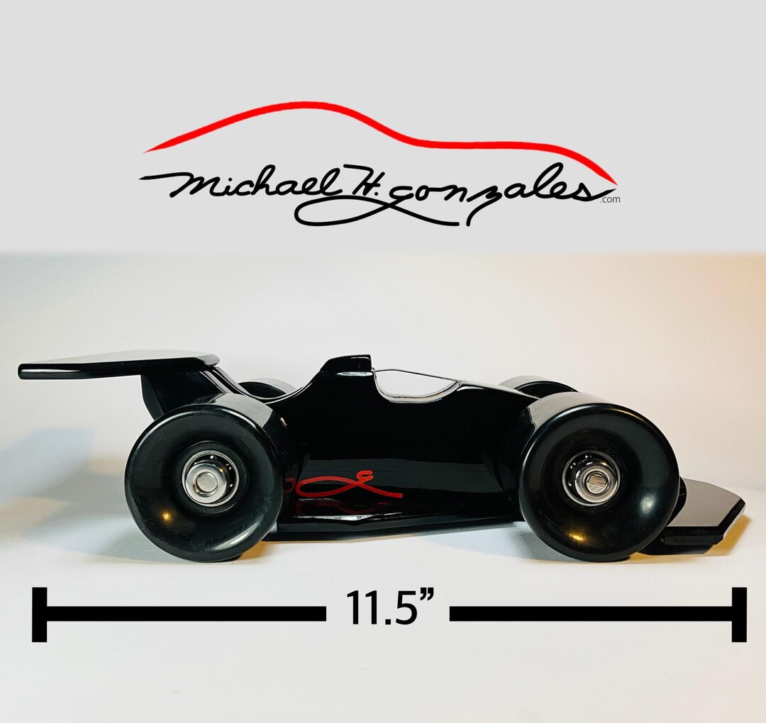 Futuristic Minimalist Indy Car Kinetic Sculpture: Polished Black ...