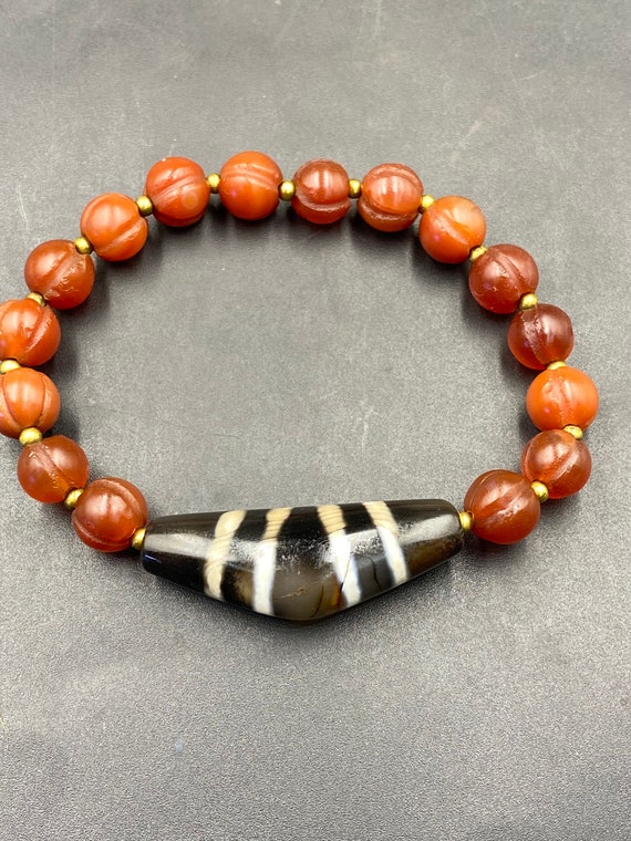 Genuine Tibetan dzi 4 stripe bead with carved carneli… - Gem