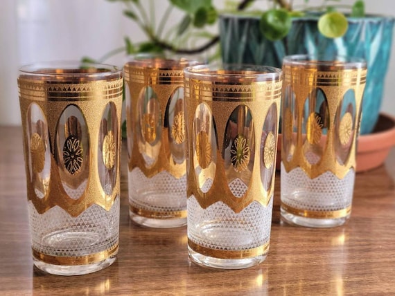 Gold glasses drinking store
