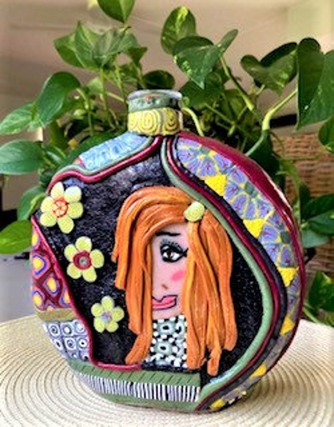 Vase With Lady's Face in Front and Leaf Shapes and Forms on Back, Round ...