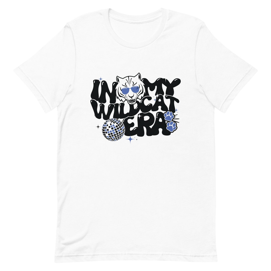 In My WILDCAT ERA Tee in Black and Royal Groovy School Wildcat Mascot ...
