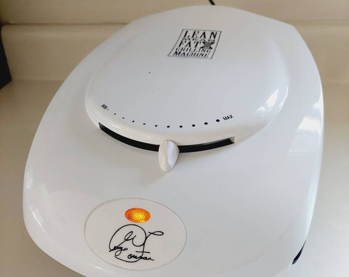 White George Forman Grill Lean Mean Fat Grilling Machine. 120V, 60hz ...
