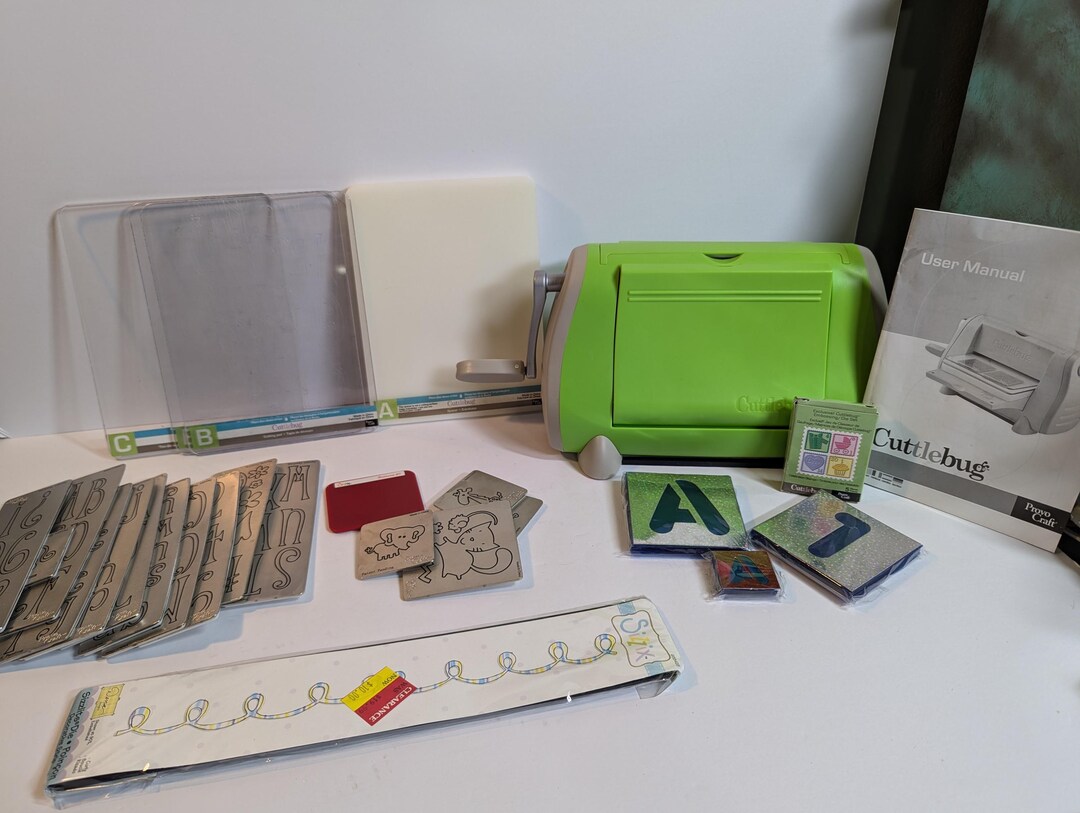 Cuttlebug Cutter and Embossing Machine & Large Lot of Accessories and ...