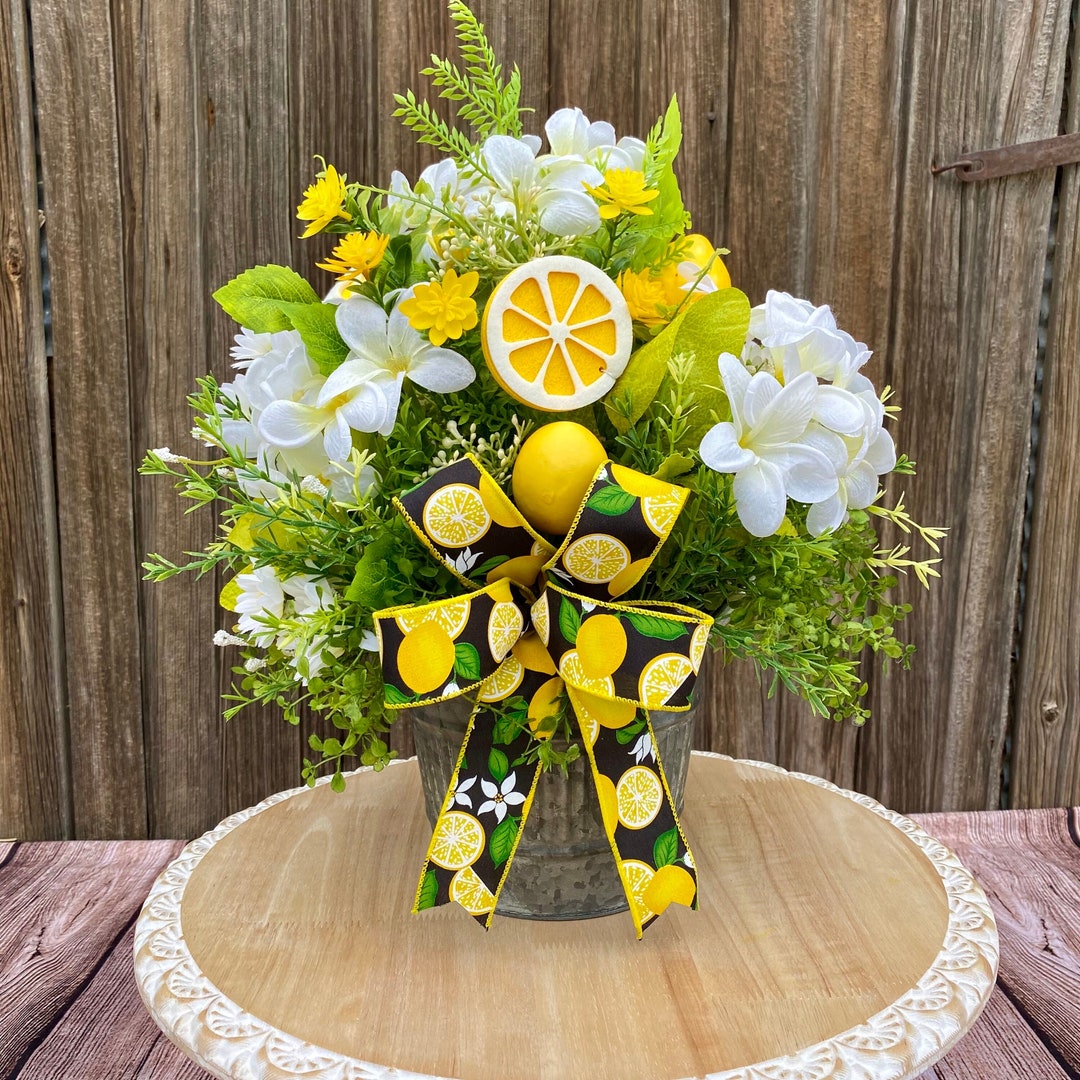 Summer Lemon Floral Arrangement With Plumeria and Daisies in a Round ...