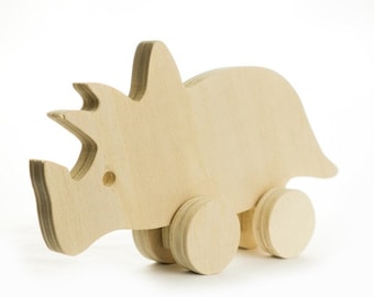 Wheels Wooden Dinosaur - Etsy