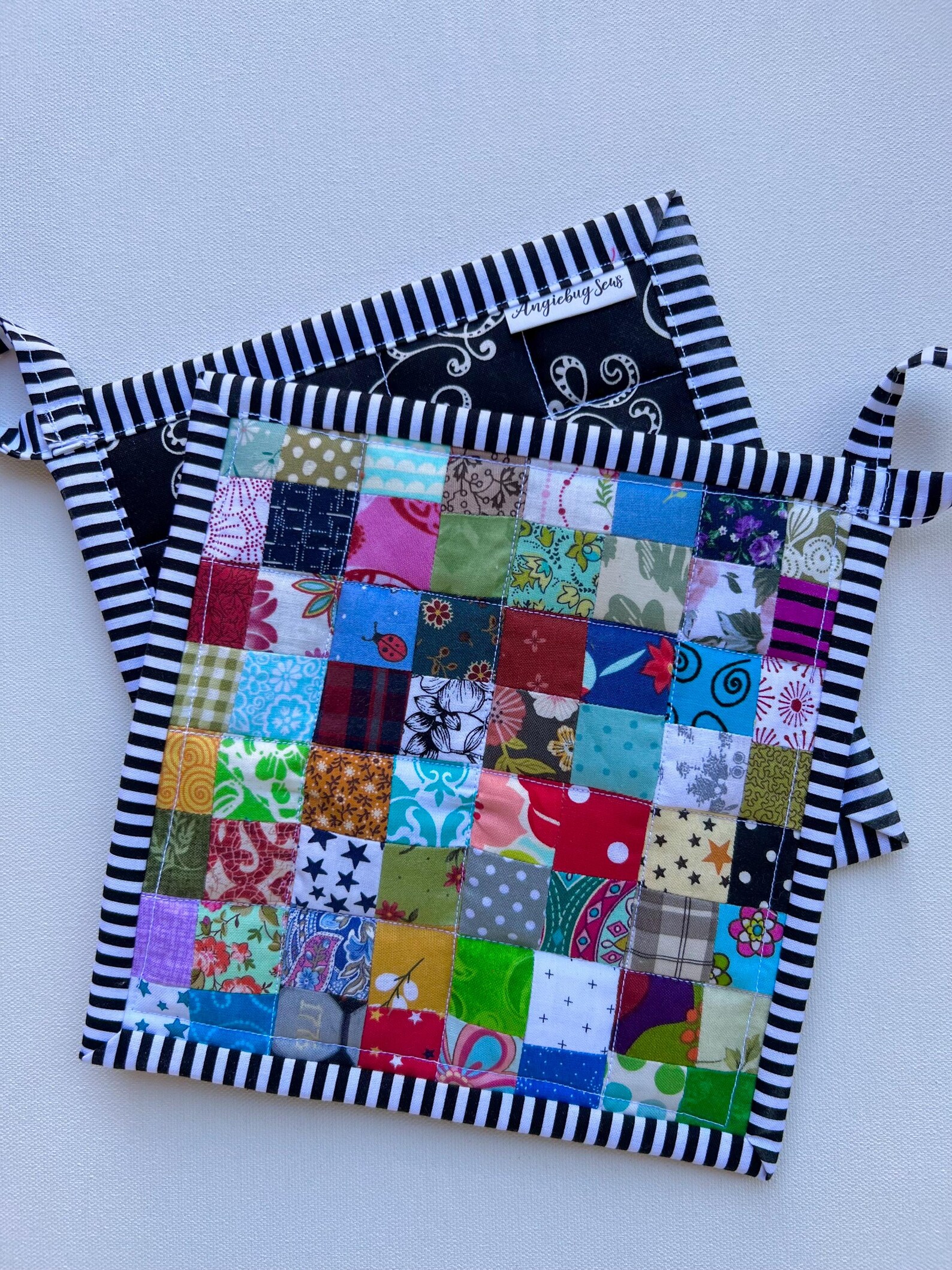 Set of Two Patchwork Potholders Hot Pads Trivets Postage Stamp Squares ...