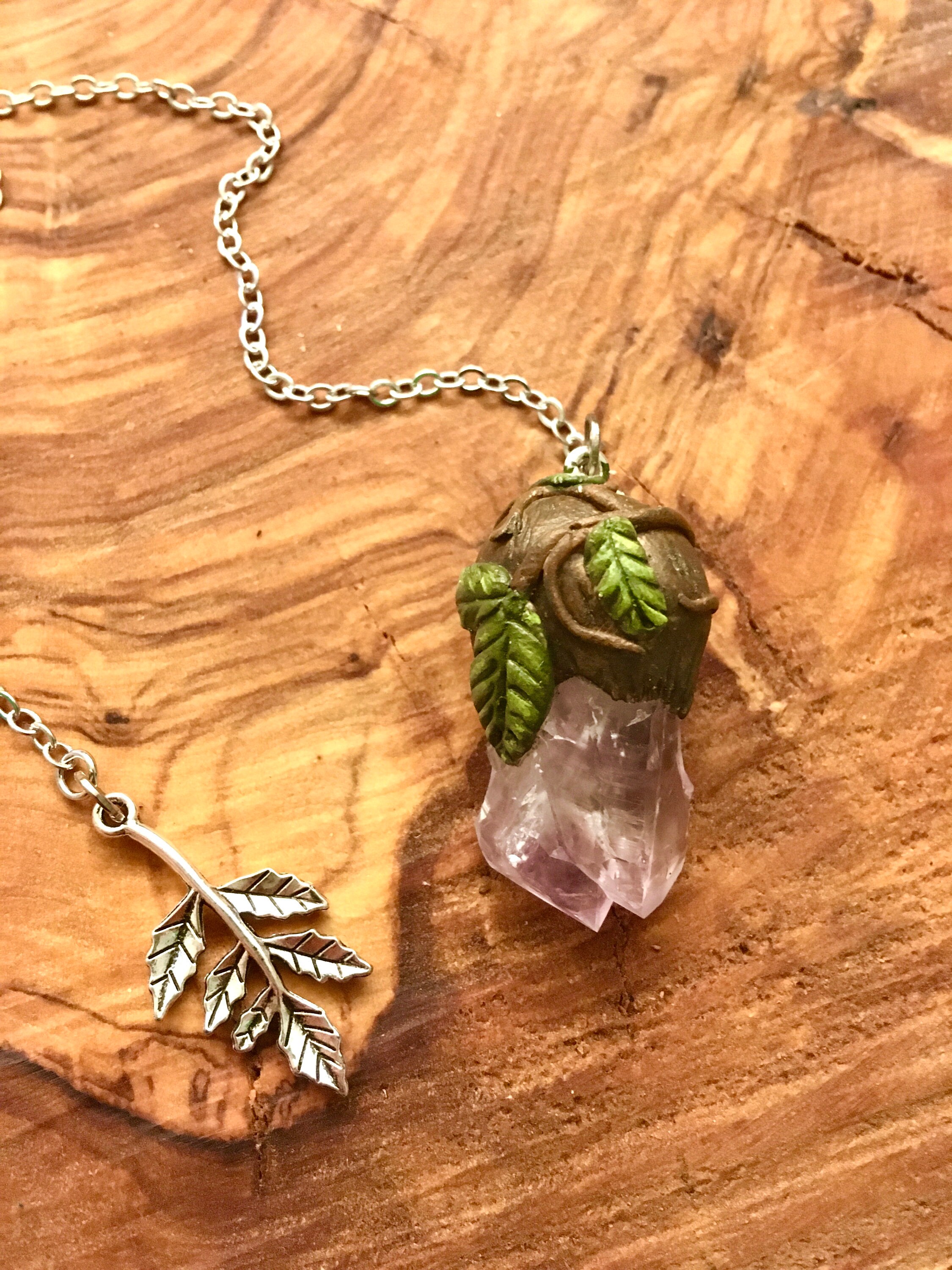 Nature-style pendulum with amethyst tip decorated with leaves | Etsy