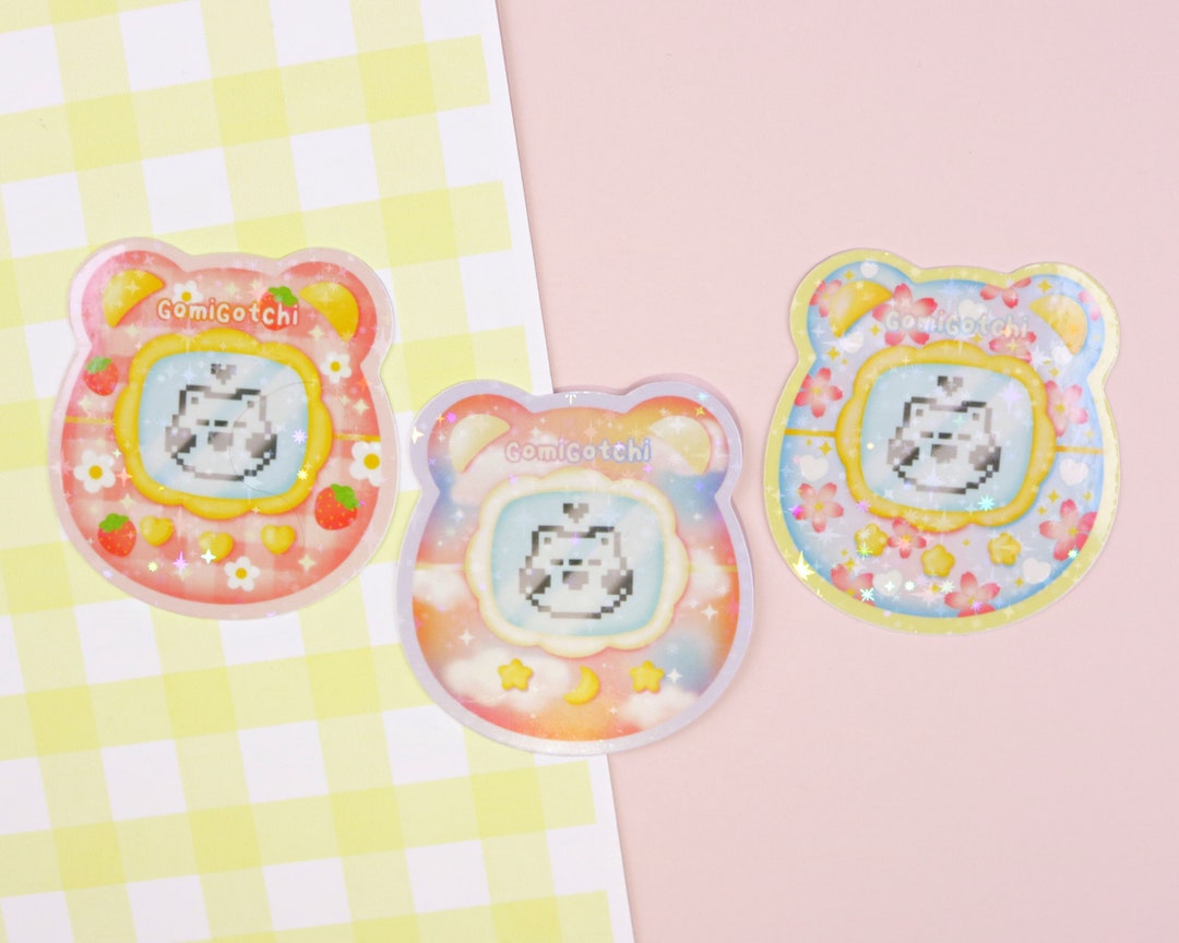 Holographic Gomigotchi | Glossy Vinyl Stickers - Cute Glossy Sticker ...
