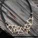 Collana geometrica taglio laser in legno, acciaio e caucciù - triangoli ...