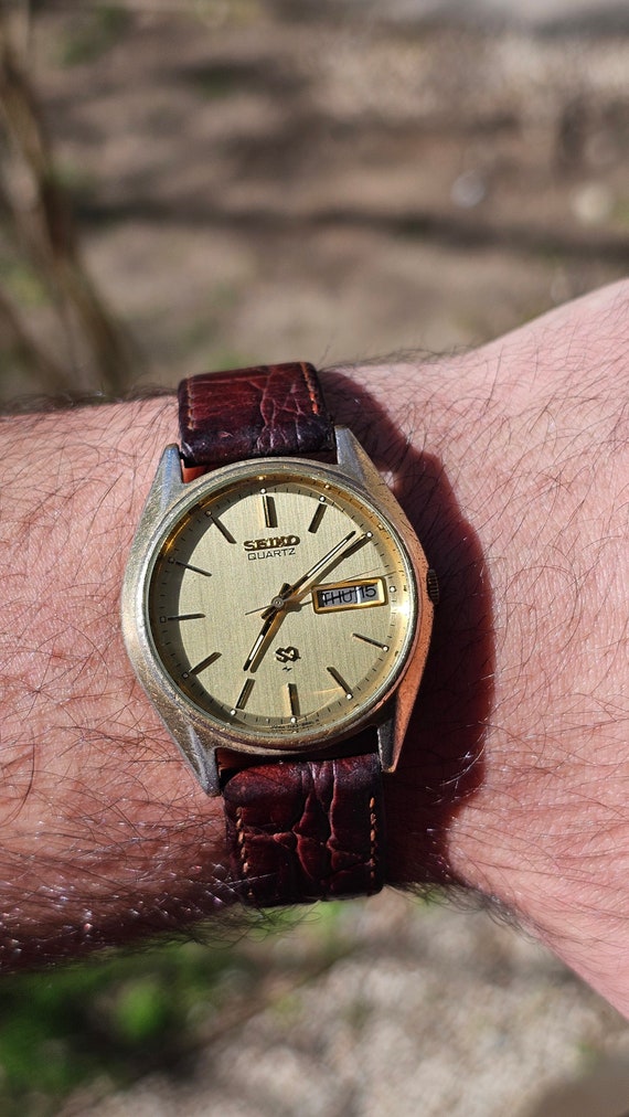 Seiko 7123-8469 day date gold tone case dial leather … - Gem