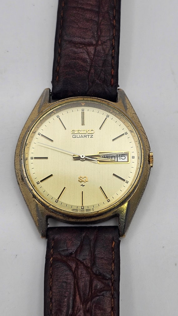 Seiko 7123-8469 day date gold tone case dial leather … - Gem