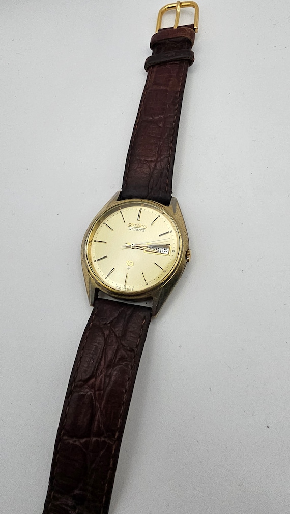 Seiko 7123-8469 day date gold tone case dial leather … - Gem