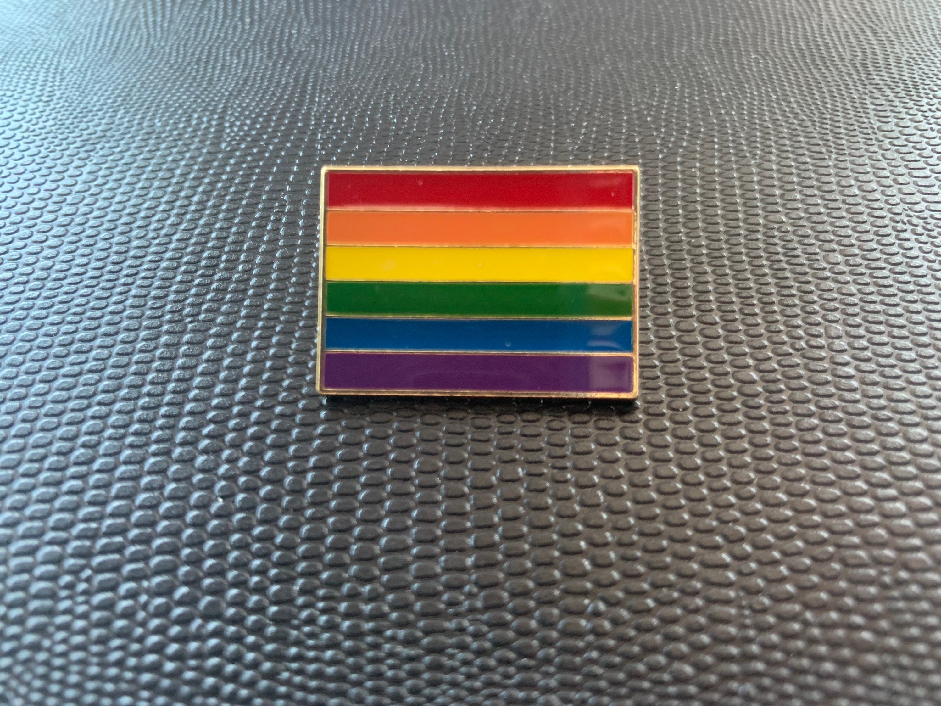 What is a pride pin - pumpdsae
