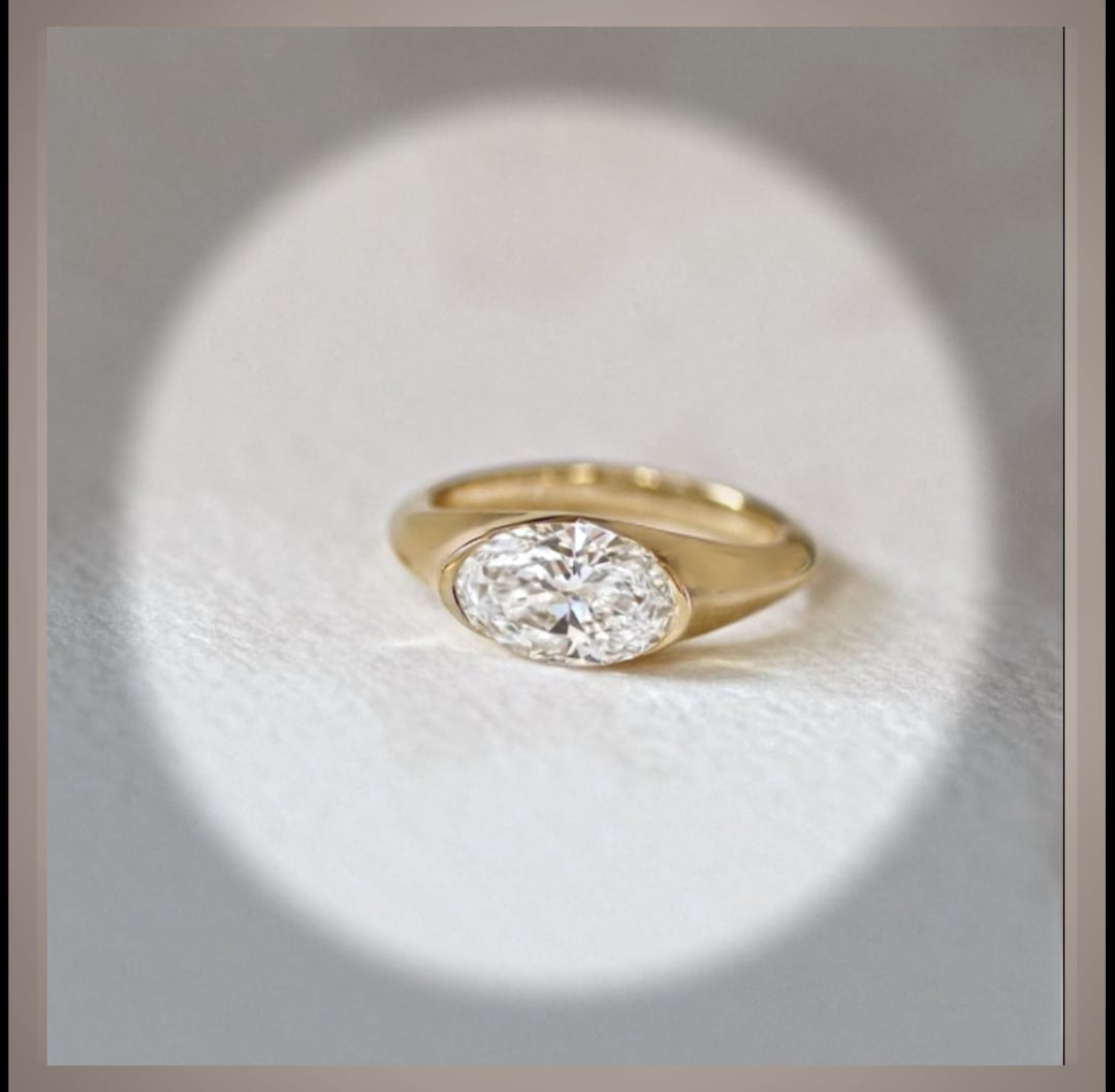 1.50 Ct Oval Cut Diamond East West Bezel Set Solitaire Engagement ...