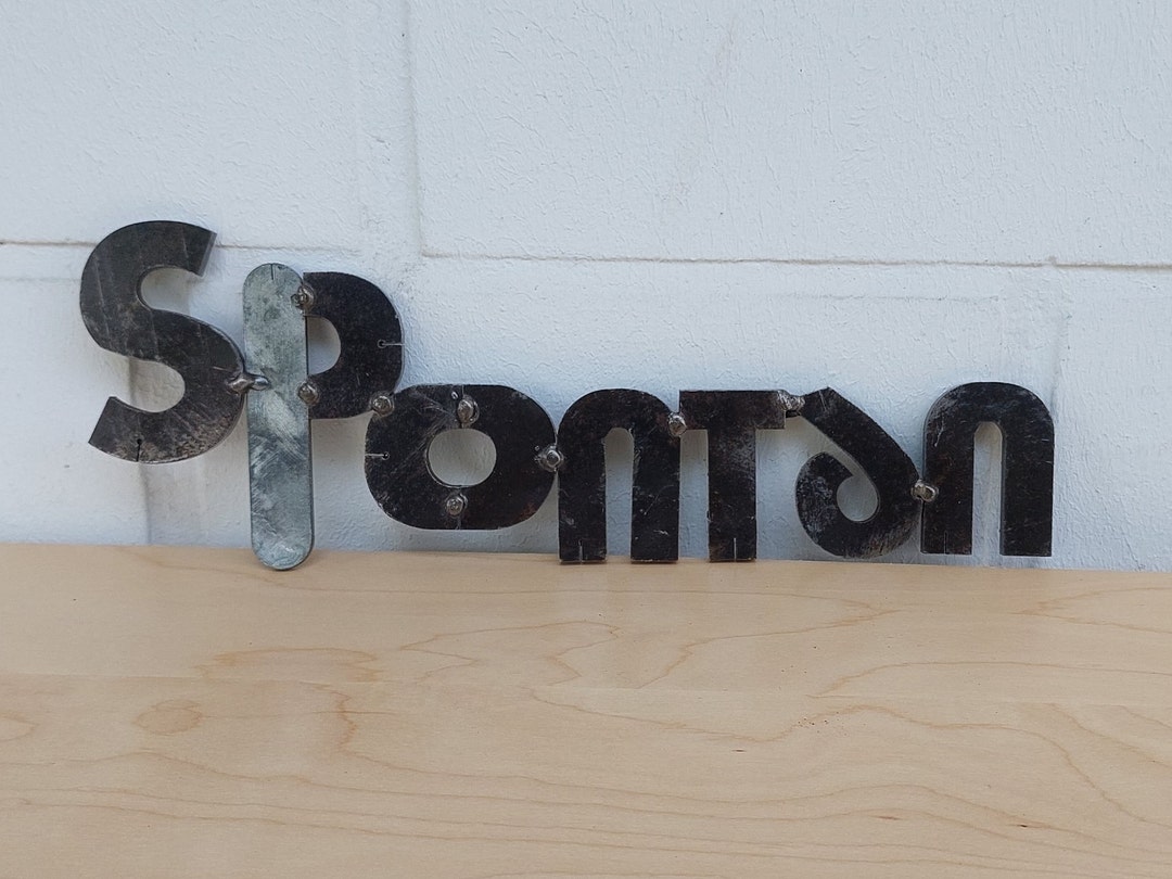 Spontaneous Word Sculpture Made of Scrap Metal Spontaneity, for a ...