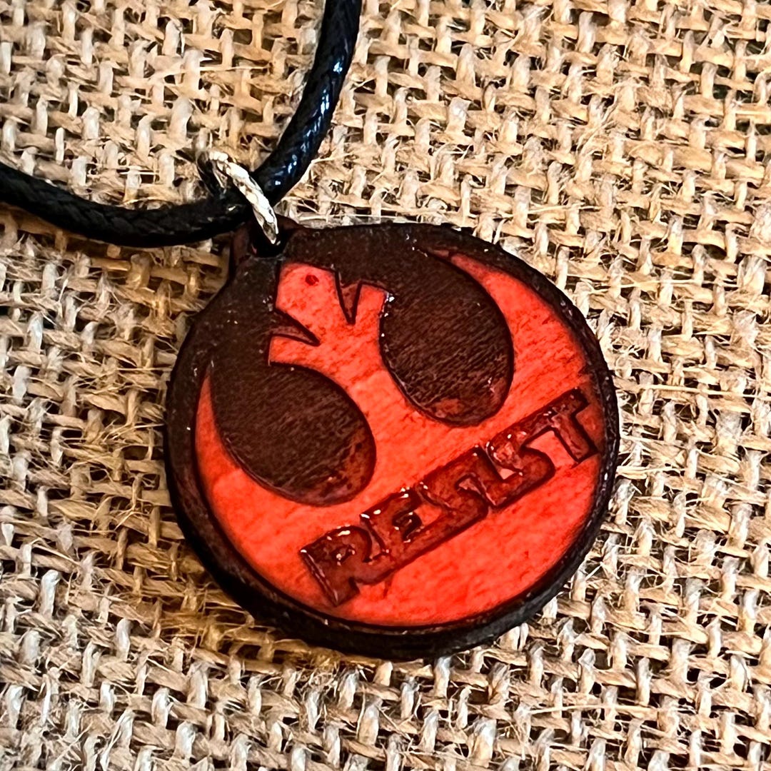 The Resistance Symbol Resist Wood Engraved Pendant Adjustable Cord ...