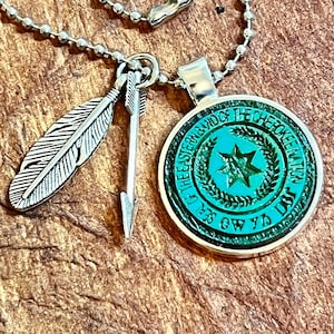 Eastern Band of the Cherokee Nation Wood Engraved Metal Bezel Pendant ...