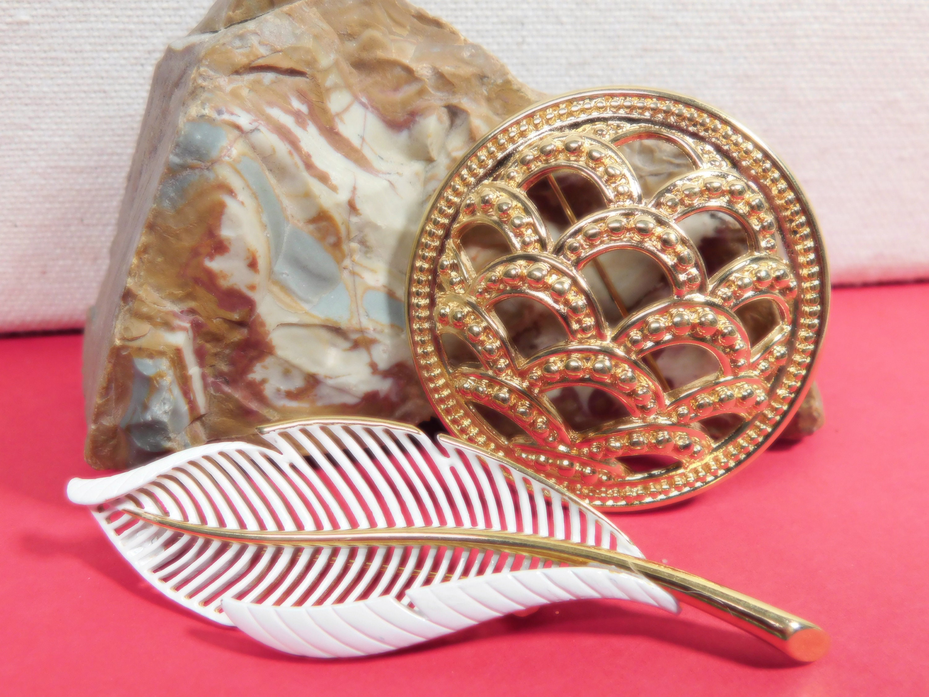 Vintage Monet pins brooches a white enamel leaf and a round wave like ...