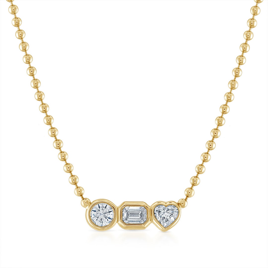 Fancy Bezel Three Stone Bezel Round Emerald Heart Cut Diamond Necklace ...