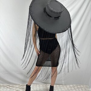 Black Hat With Long Fringe and Wide Brim for a Photo Shoot Music ...