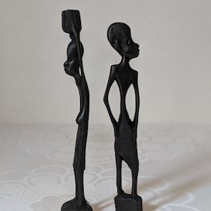 African Ebony Stick Figures. "skinny Art". Two Standing and One Letter ...