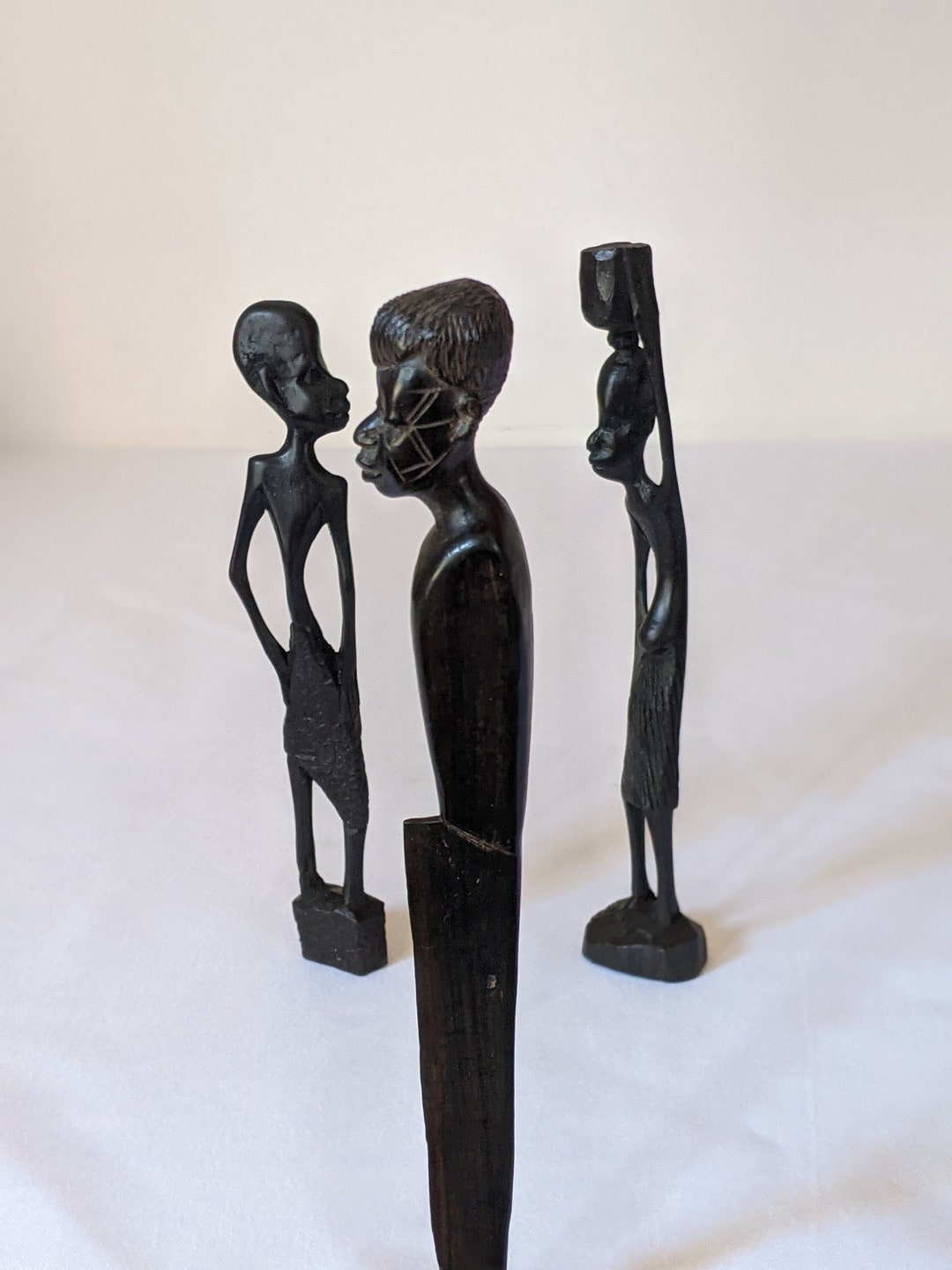 African Ebony Stick Figures. "skinny Art". Two Standing and One Letter ...