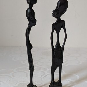 African Ebony Stick Figures. "skinny Art". Two Standing and One Letter ...