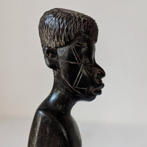 African Ebony Stick Figures. "skinny Art". Two Standing and One Letter ...