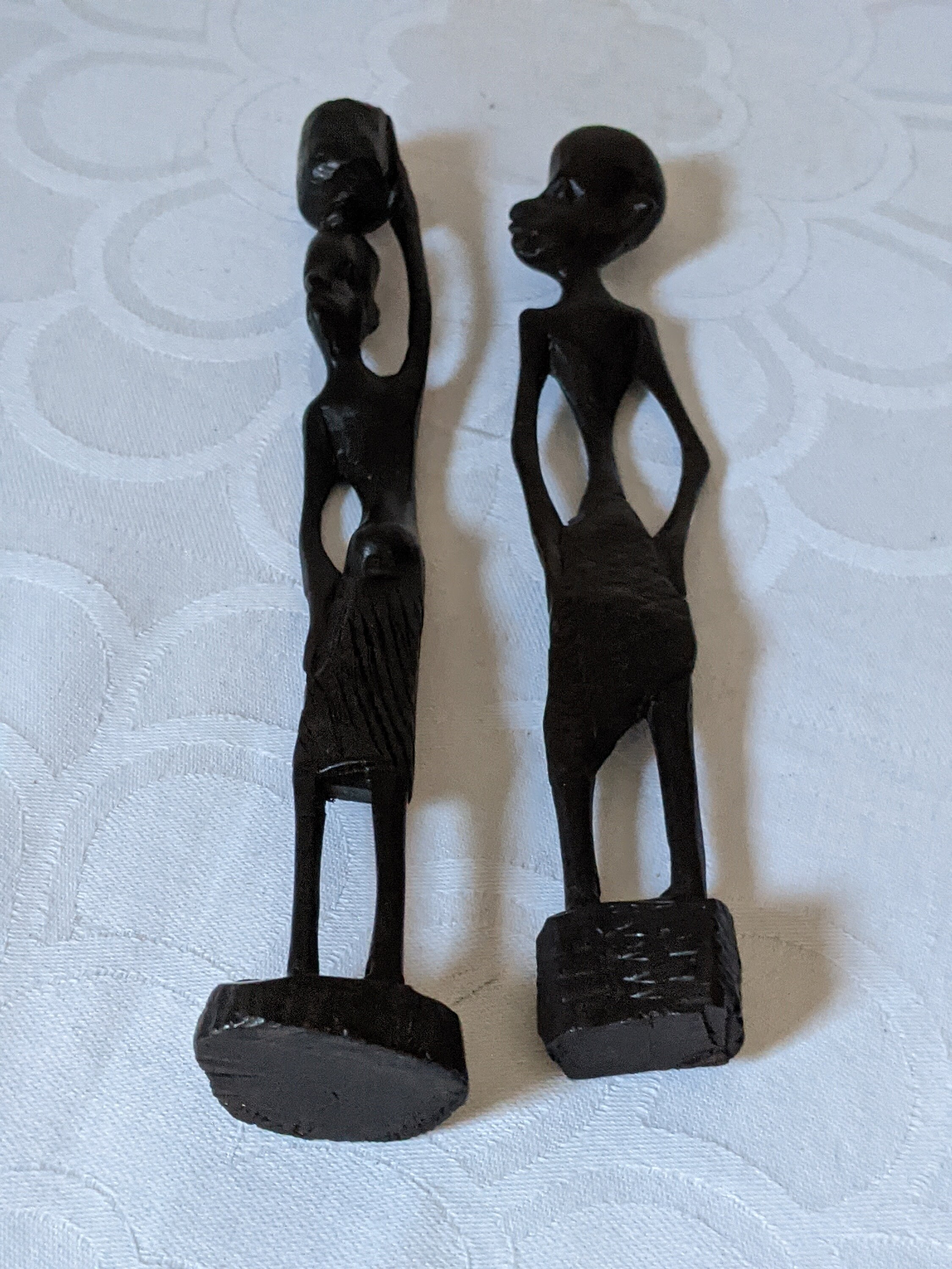 African Ebony Stick Figures. skinny Art. Two Standing and One Letter ...