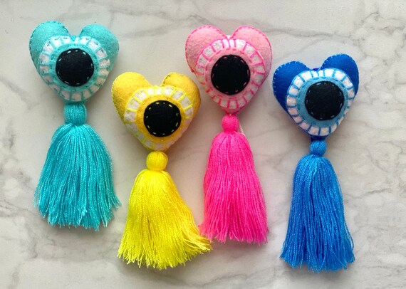 Evil eye tassel store