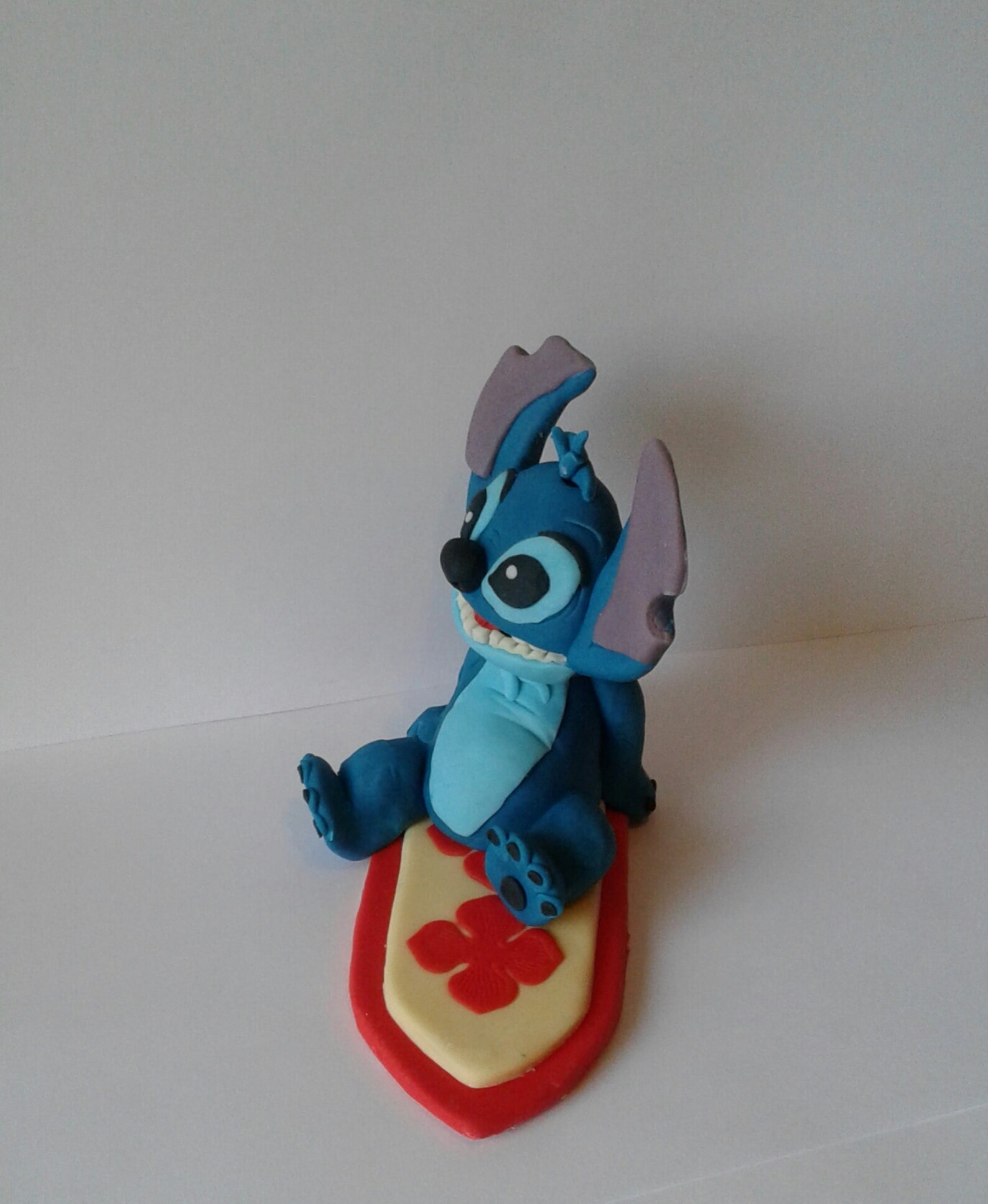 Edible cake decoration STITCH ON A SURFING board | Etsy