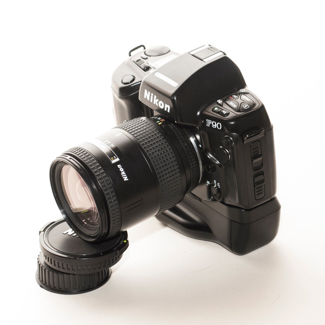 Nikon F90 Film Camera With 28-85mm F/3.5-4.5 Nikon Lens. Nikon MB 10 ...