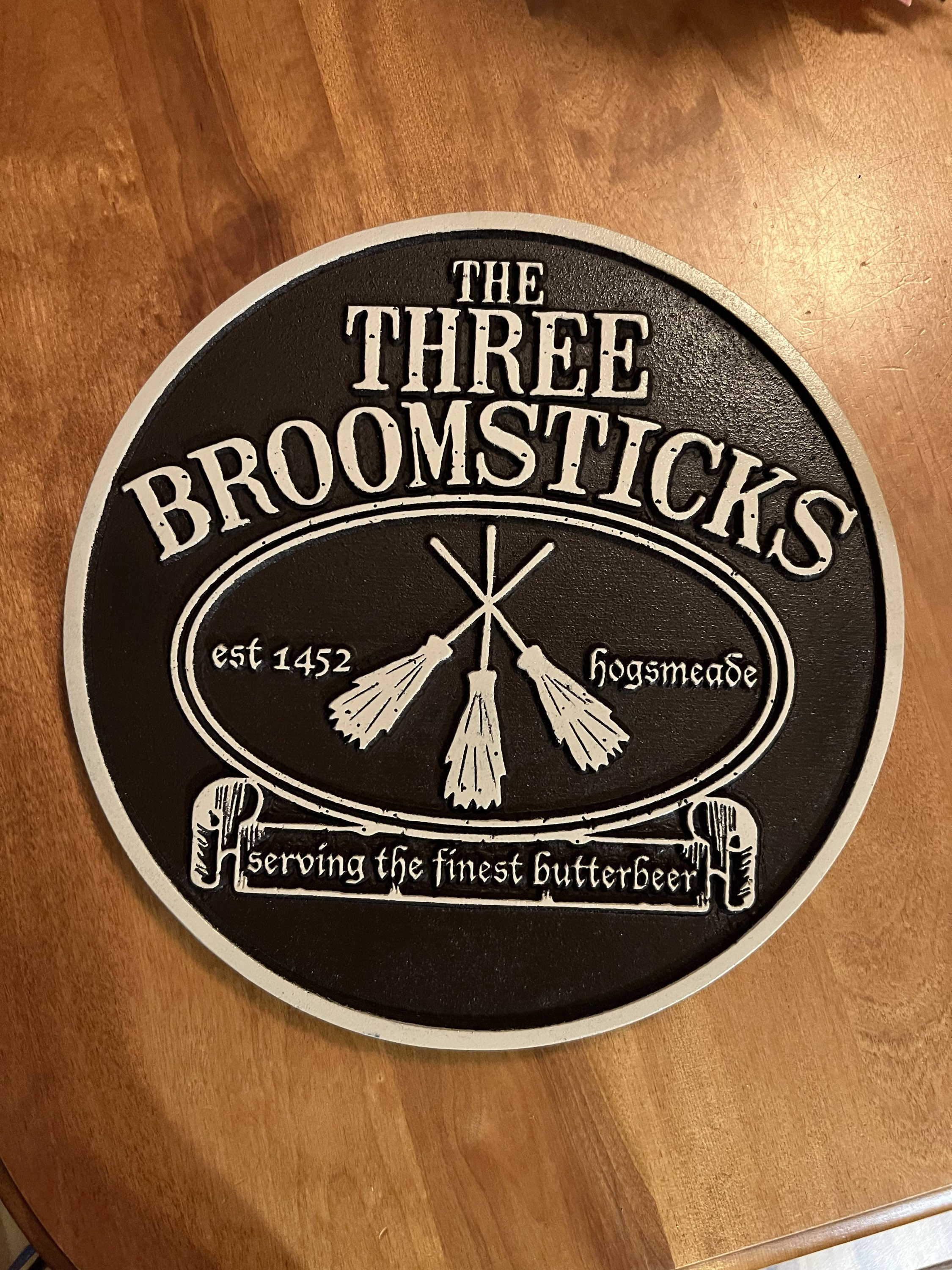 Three Broomsticks Logo
