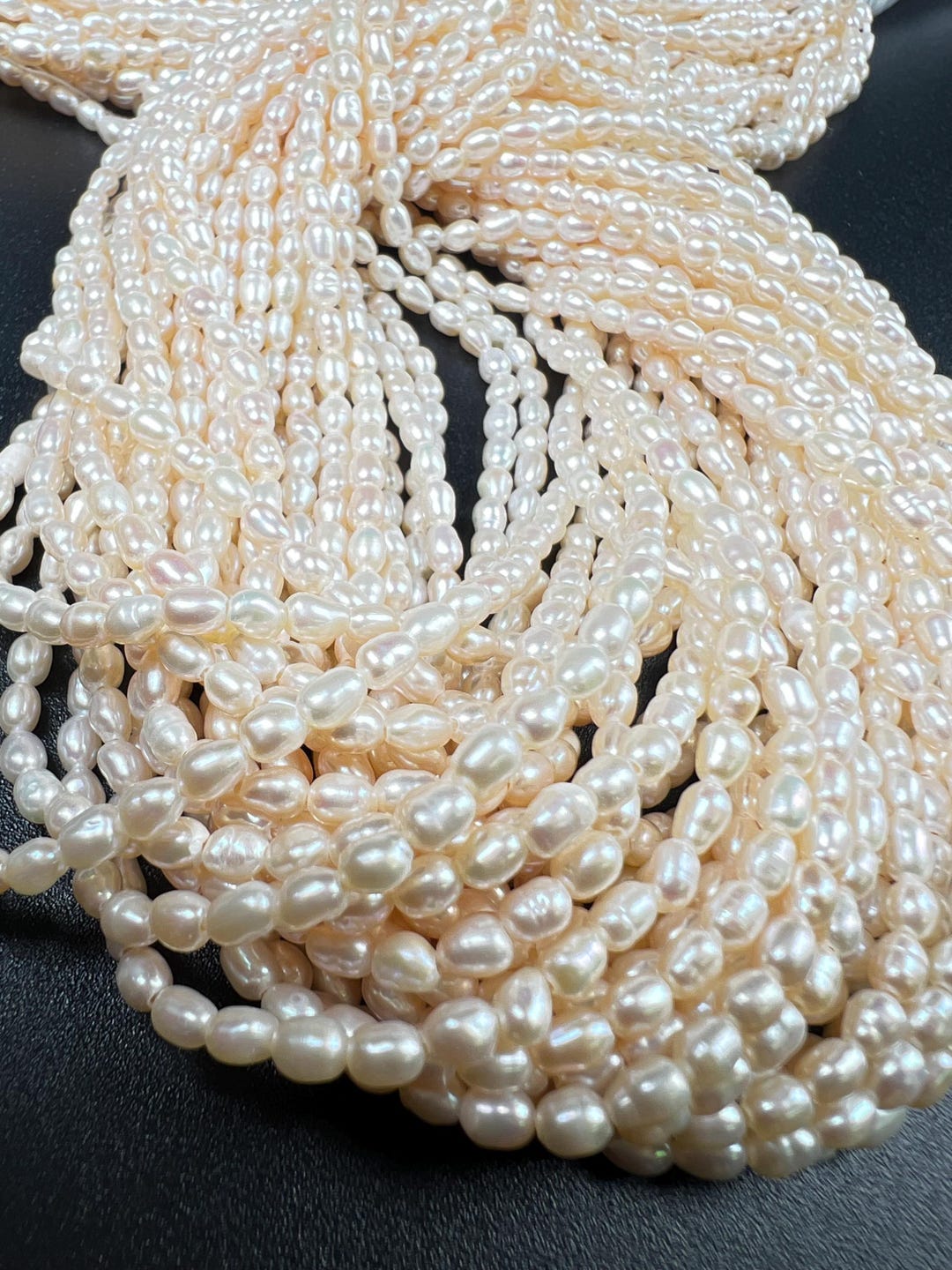 Natural Freshwater Pearl Ivory White Rice Oval AAA Quality Pearl Cream ...