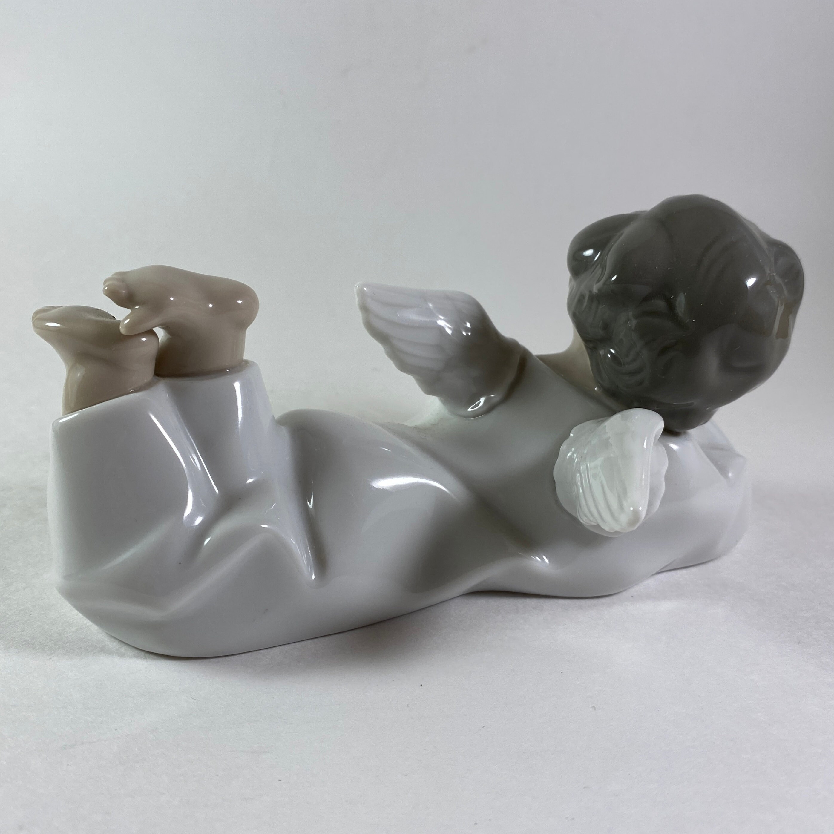 Lladro Angel Figurine in Glossy Porcelain Lying Down With Legs - Etsy