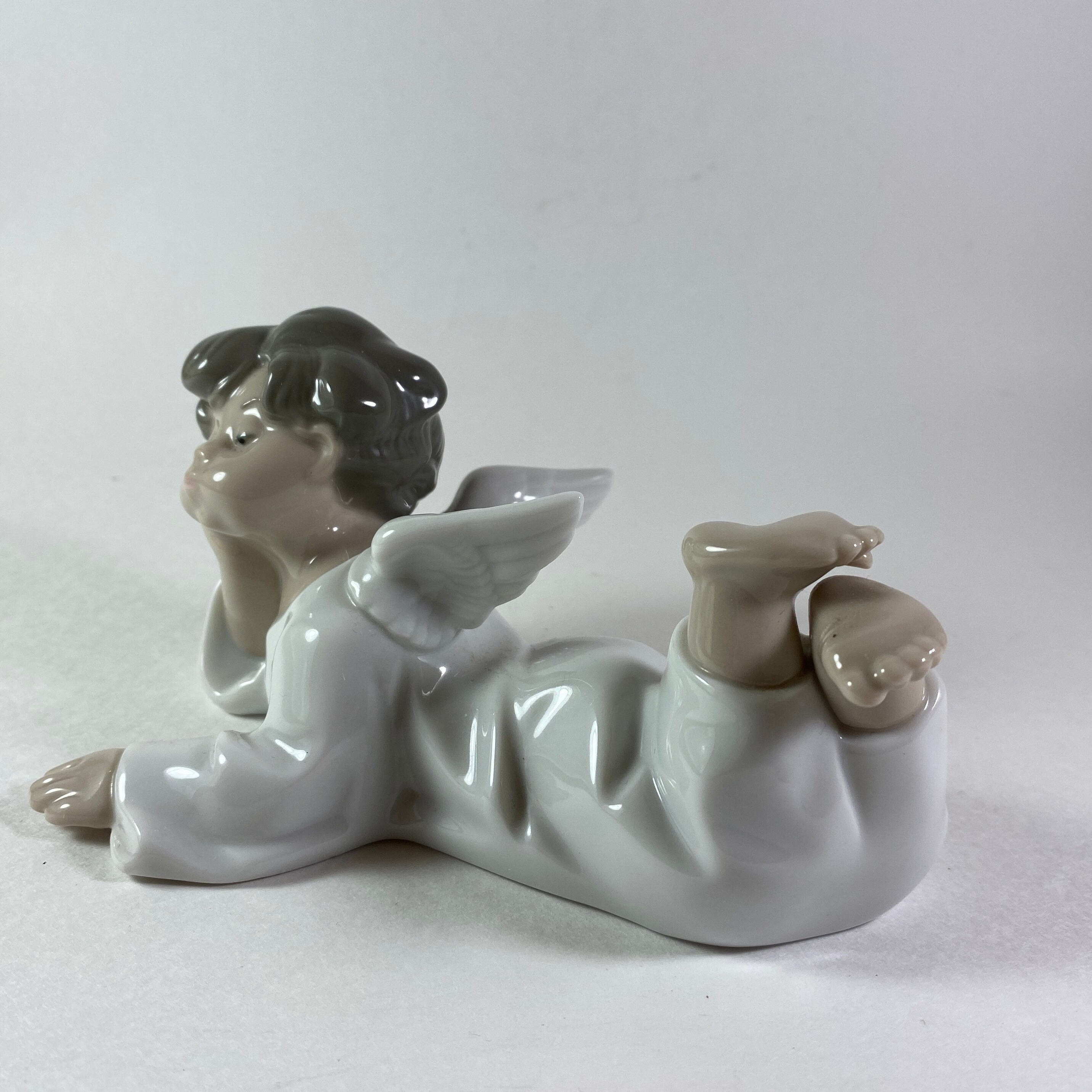 Lladro Angel Figurine in Glossy Porcelain Lying Down With Legs - Etsy