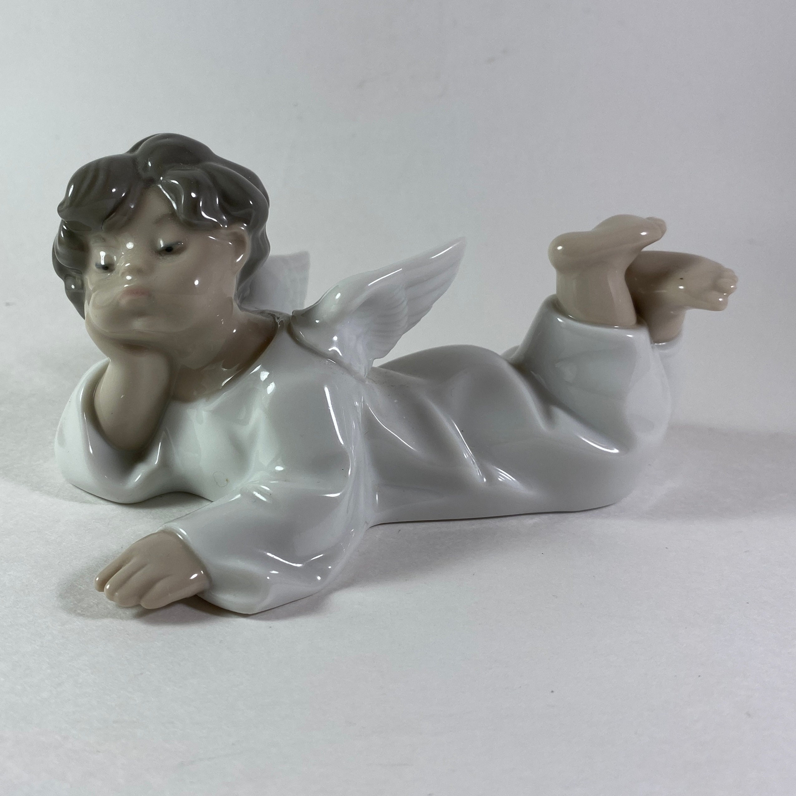 Lladro Angel Figurine in Glossy Porcelain Lying Down With Legs - Etsy