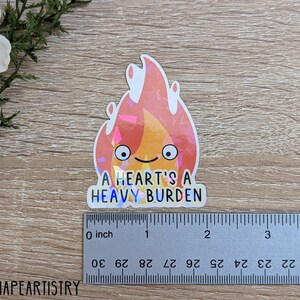 A Heart's a Heavy Burden Sticker | Holographic Sticker, Calcifer ...