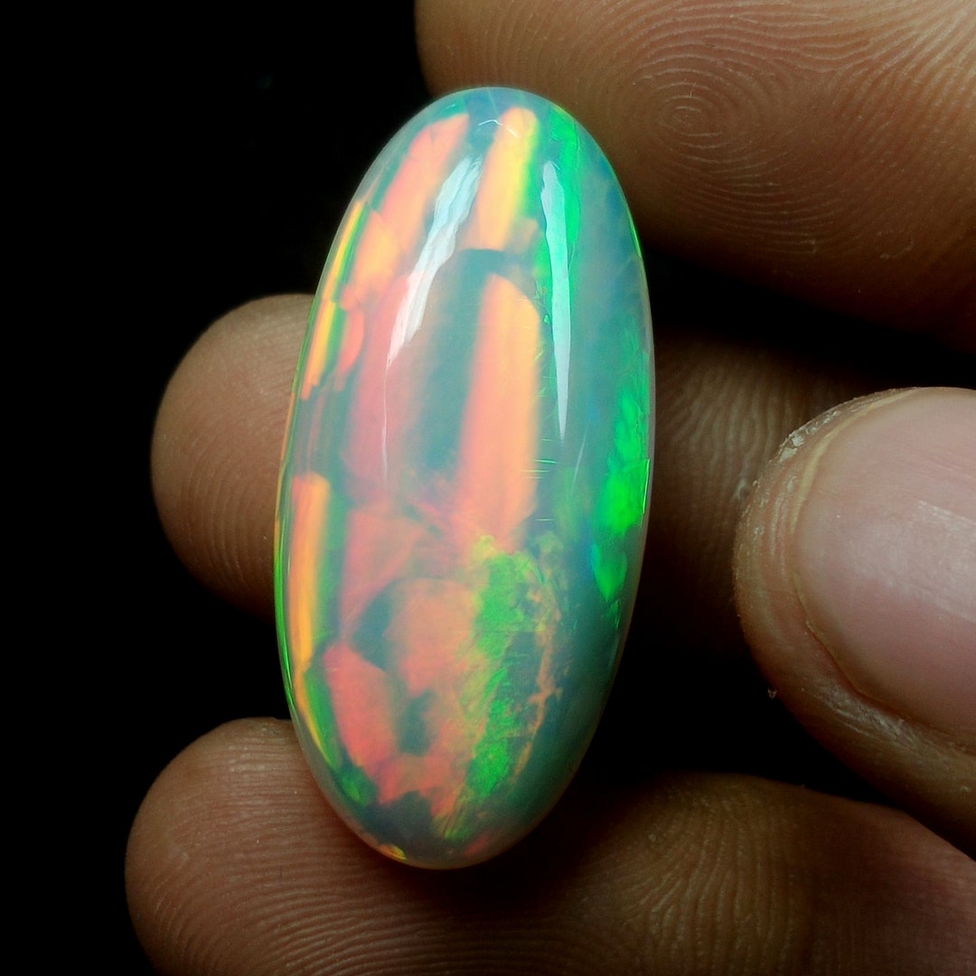 19.65 Ct, Amazing Fire Play Opal, Ethiopian Opal, Long Oval Cabochon ...