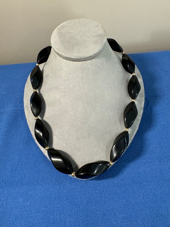 vintage black plastic resin - Gem