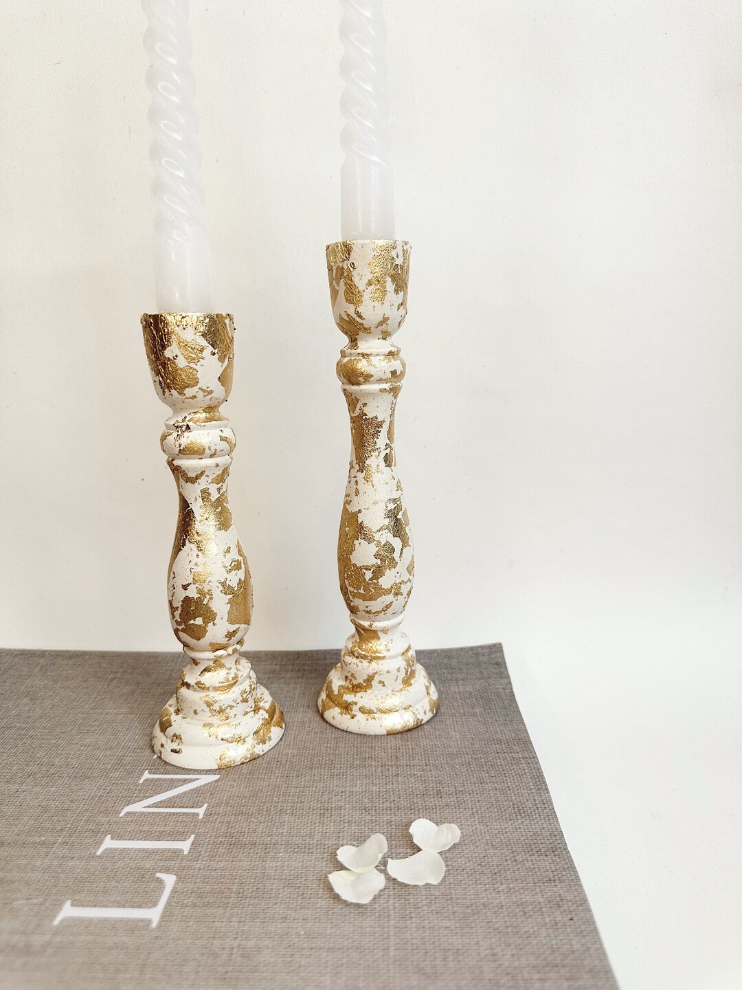 Candlesticks | A Pair of Ivory Candlesticks With Gold Leaf Detail ...