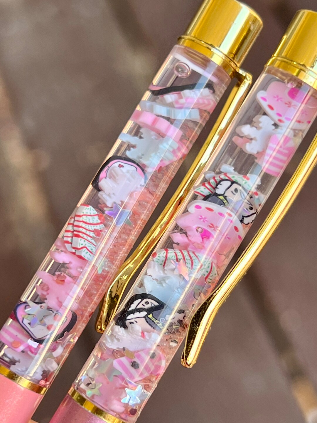Christmas Float Pen. Penguins, Nut Crackers and More. Pretty in Pink ...