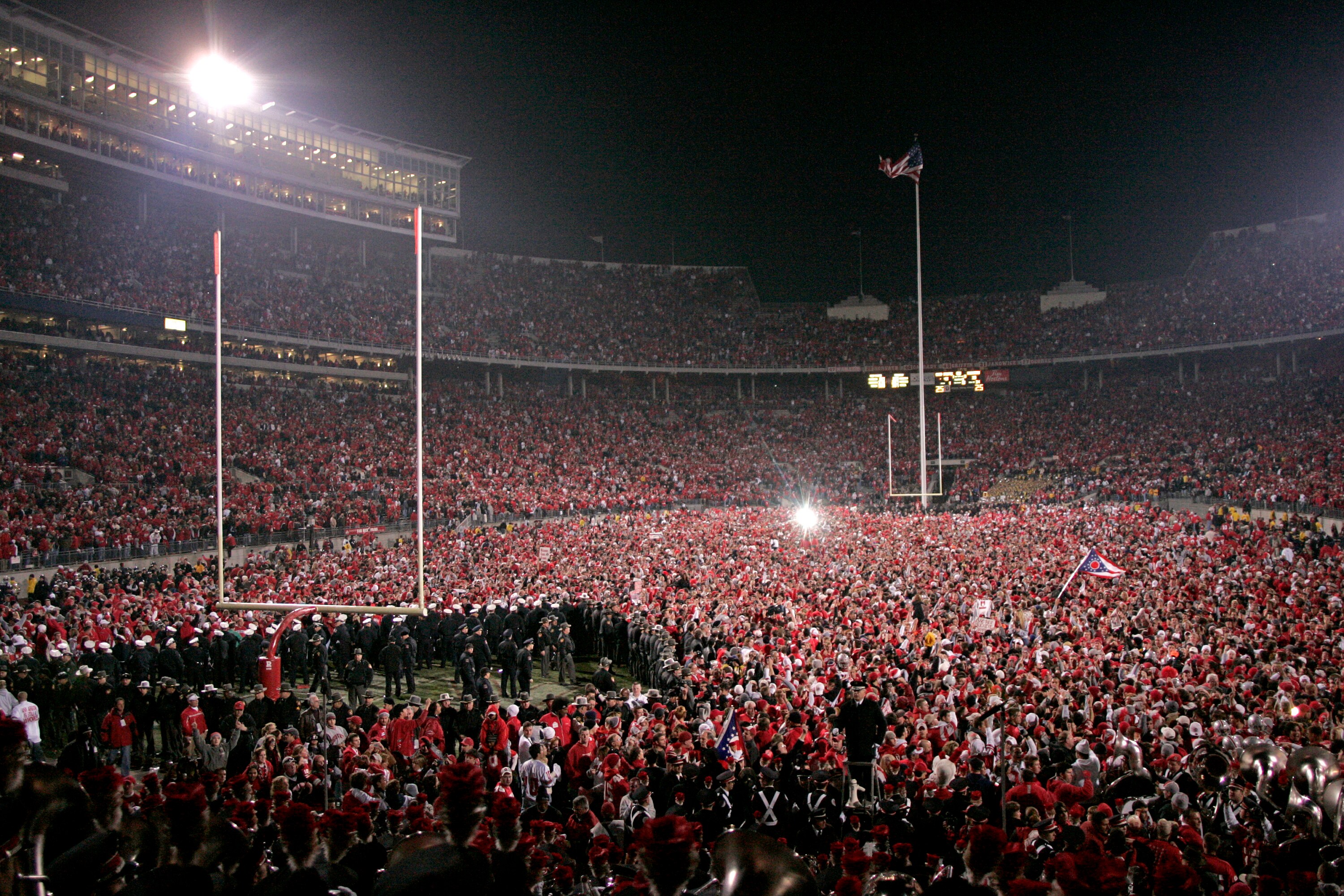 Ohio State fans rush the field after their 2006 win over | Etsy