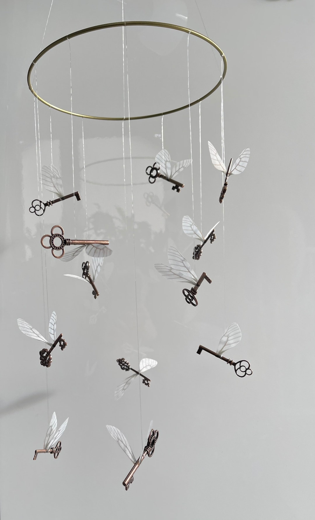 Mobile Flying Keys 12 Keys Gold Flying Key Mobile, Magical Mobile ...