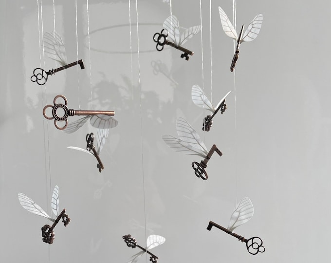 Mobile Flying Keys 12 Keys Gold Flying Key Mobile, Magical Mobile ...