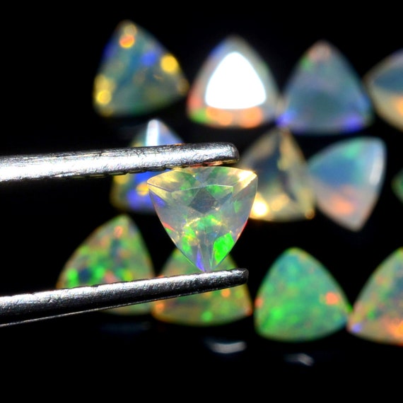 Ethiopian Opal Trillion Cut Stone Ethiopian Faceted Opal | Etsy Ethiopian Opal Trillion Cut Stone Ethiopian Faceted Opal | Etsy
