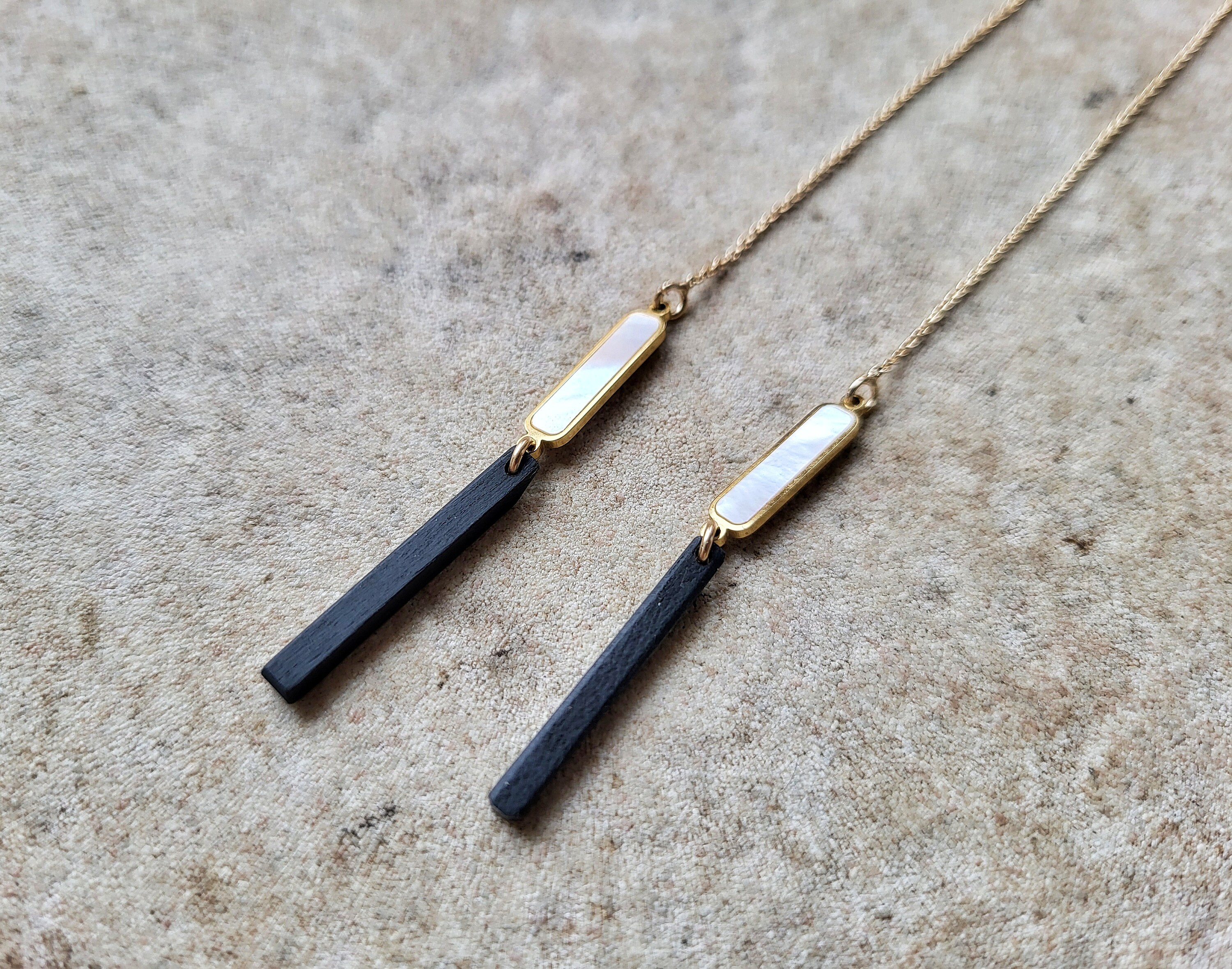 Wire Chains Crossing the magic Flute Ears in Black Ebony Wood and ...