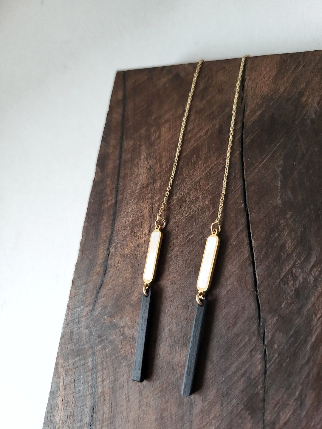 Wire Chains Crossing the magic Flute Ears in Black Ebony Wood and ...