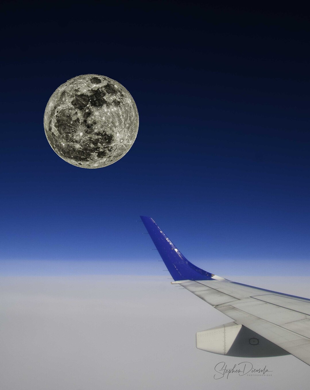 Giant Moon Over Wing, Showing Sky Deep Purple and Twilight Colors ...