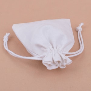 100 Pcs of White Small Cotton Drawstring Pouches | Customized Jewellery ...